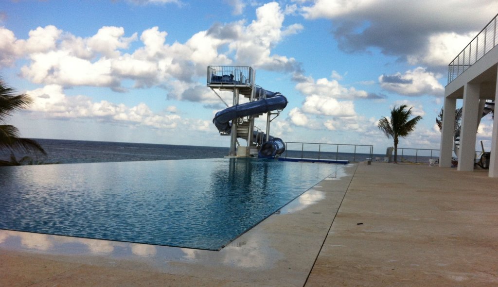 finished Bahamas slide w infinity pool | Aquatics by Westwind